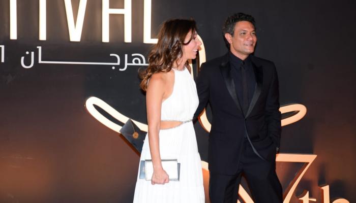 آسر ياسين وزوجته في مهرجان الجونة.. Man In Black and Woman In White (صور)
